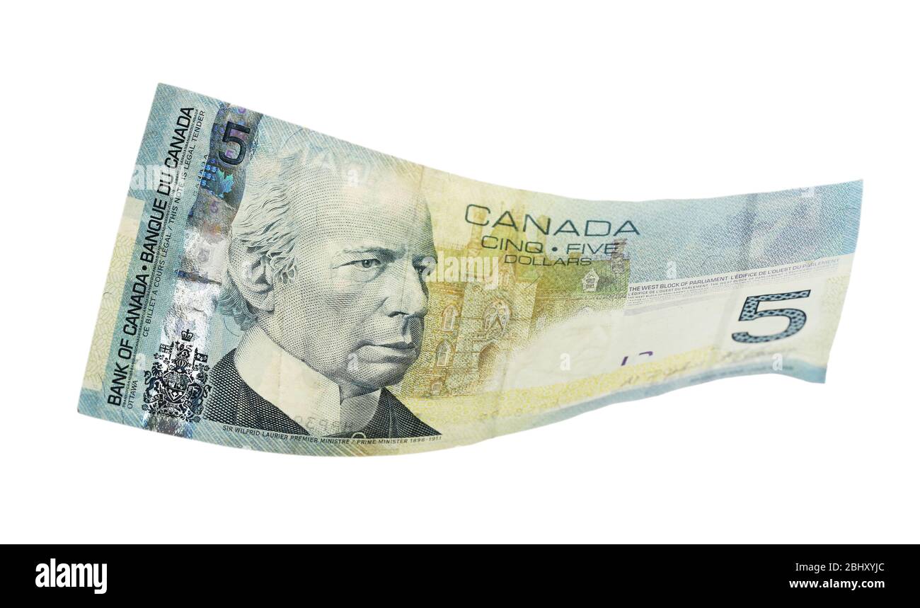 Canadian 5 Dollar, isolated on white Stock Photo - Alamy