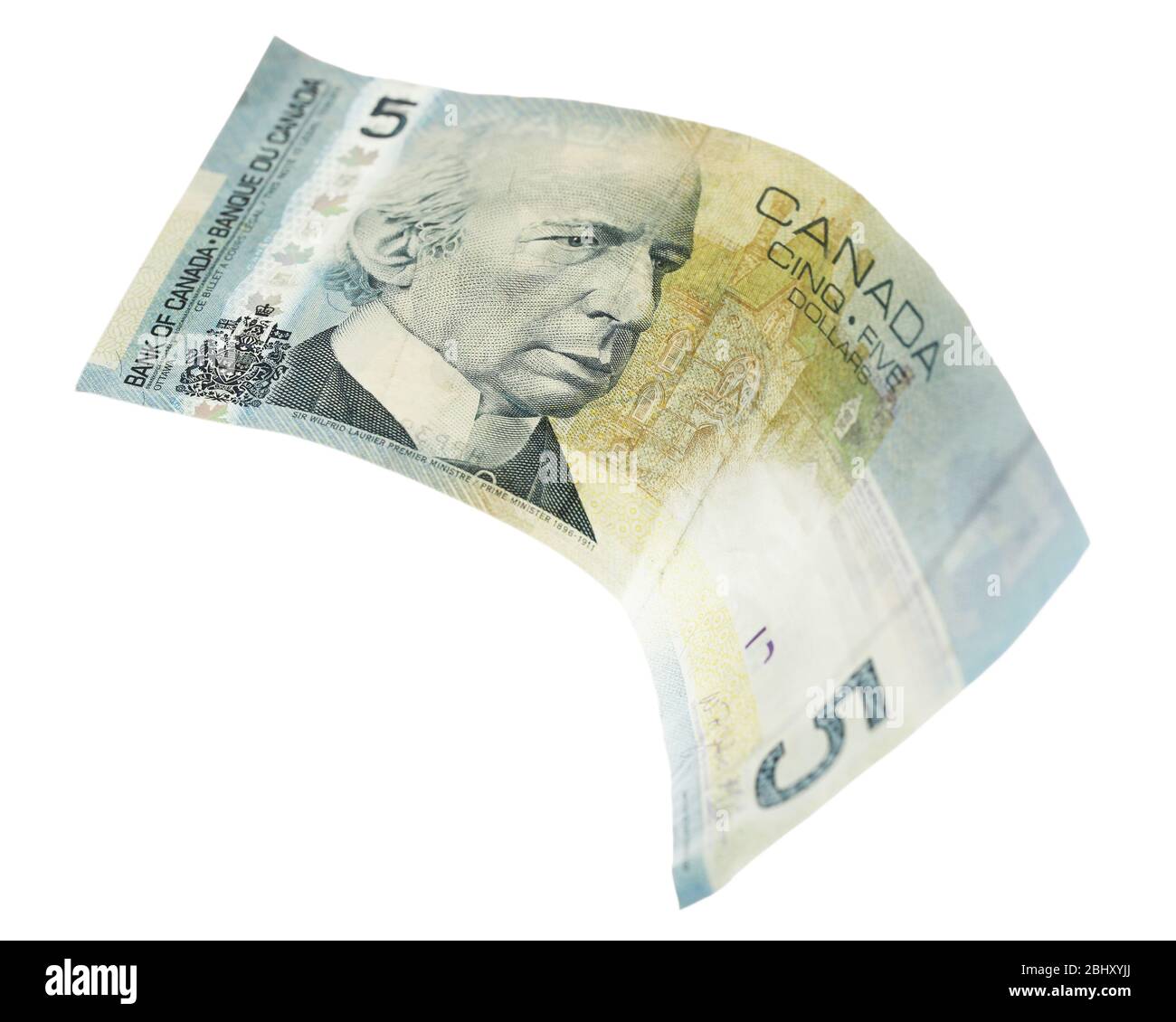 Canadian 5 Dollar, isolated on white Stock Photo - Alamy