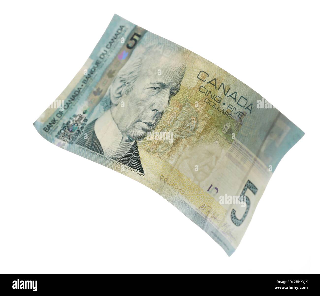 Canadian 5 Dollar, isolated on white Stock Photo - Alamy