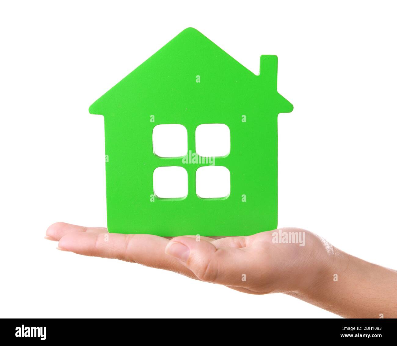 Female hand with small model of house isolated on white Stock Photo - Alamy