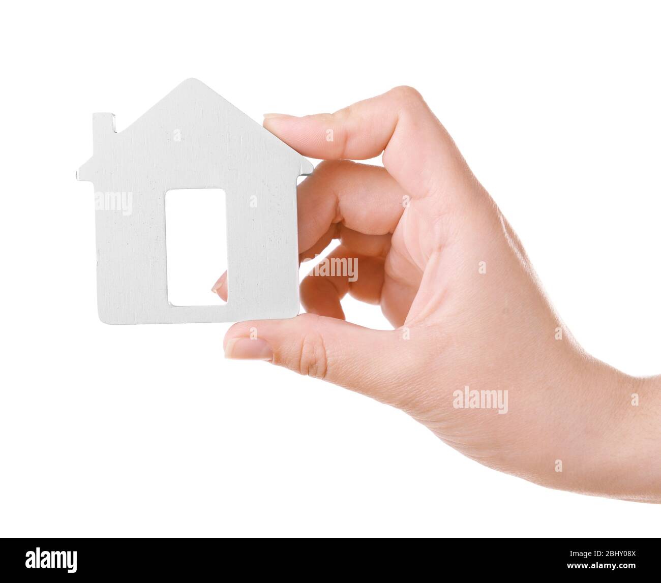 Female hand with small model of house isolated on white Stock Photo - Alamy
