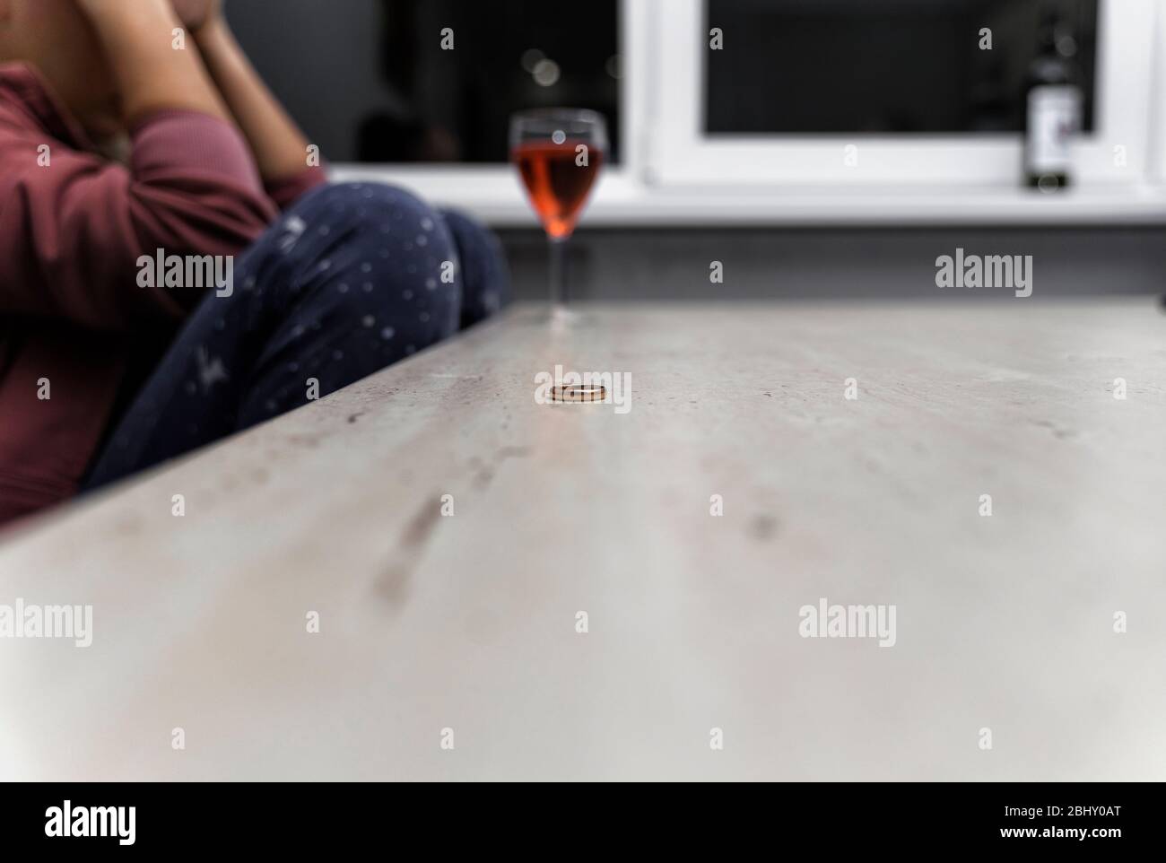 Depressed girl head on table hi-res stock photography and images - Alamy
