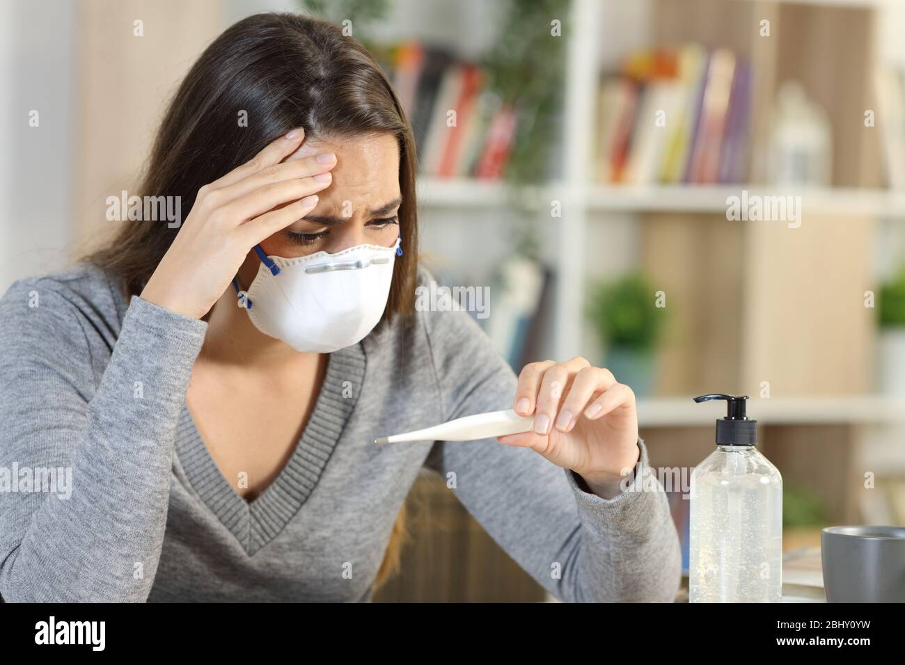 Teenager fever thermometer hi-res stock photography and images - Alamy