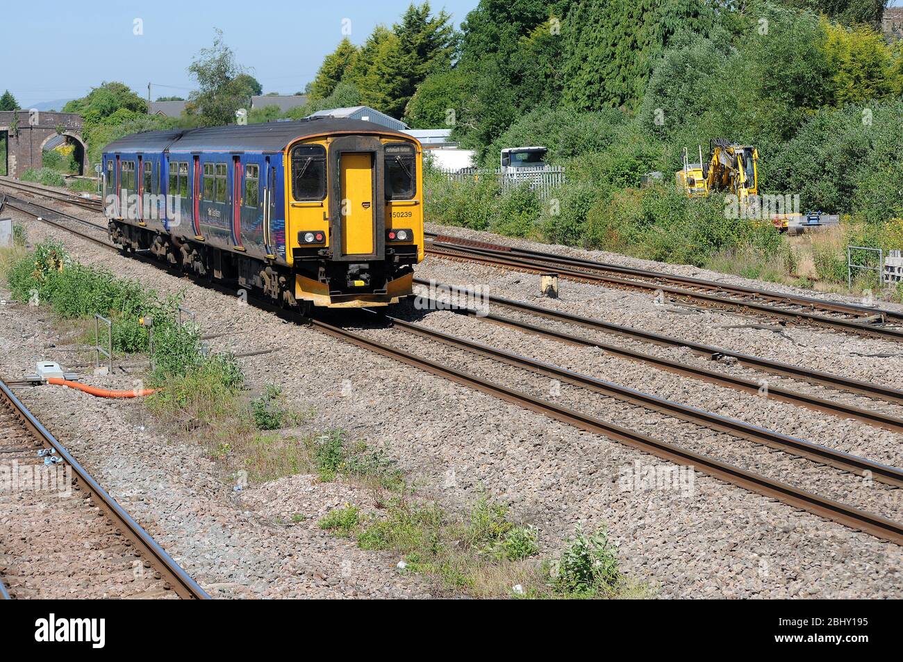 150239 passes the site of Magor Station with a service for Cardiff ...