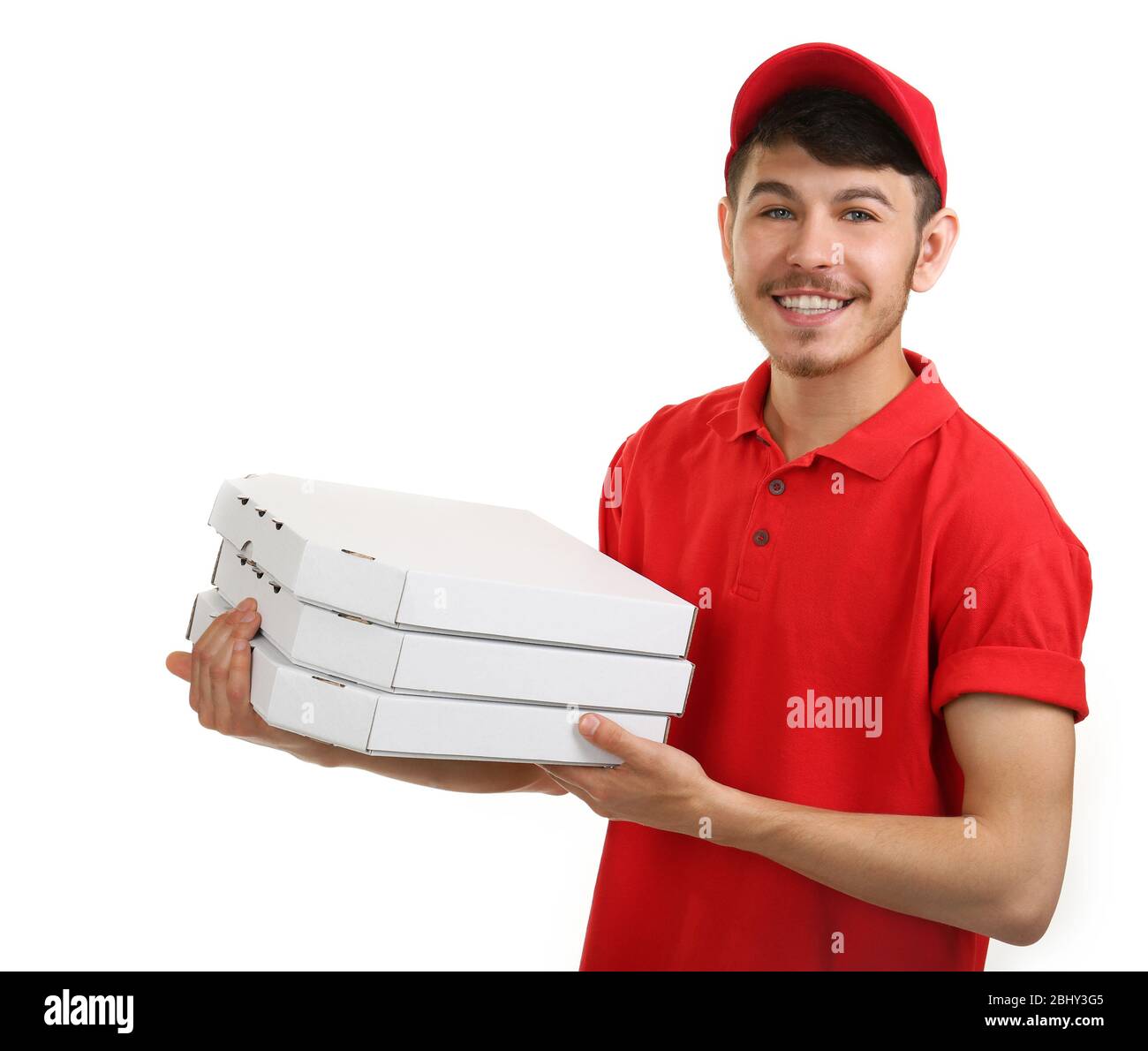 Delivery boy with cardboard pizza box isolated on white Stock Photo - Alamy