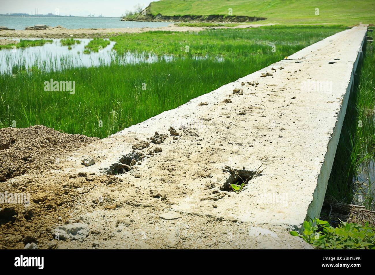 Concrete bridge across river in country Stock Photo - Alamy