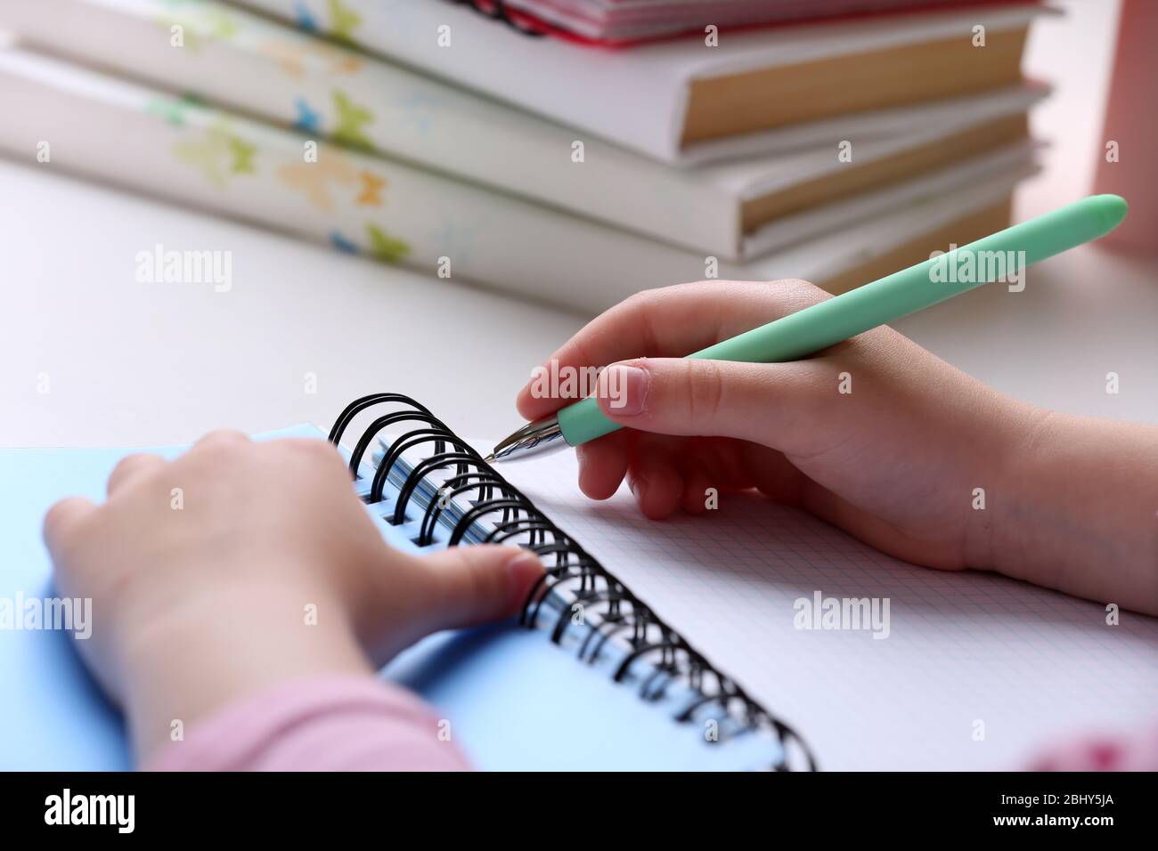 Kids hands drawing on notebook at desktop, closeup Stock Photo - Alamy
