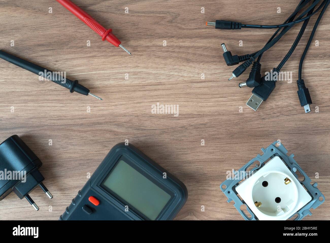 Multimeter and power supply cables. conducting tests and electrical ...