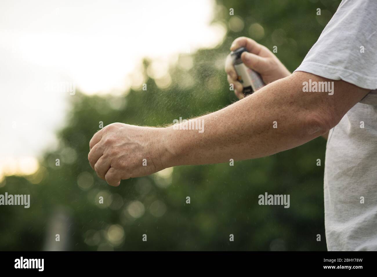 Woman mosquito spraying hi-res stock photography and images - Alamy
