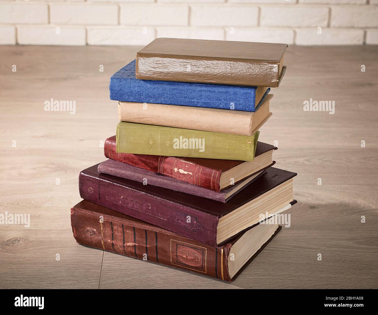 Heap of old books on floor close up Stock Photo - Alamy