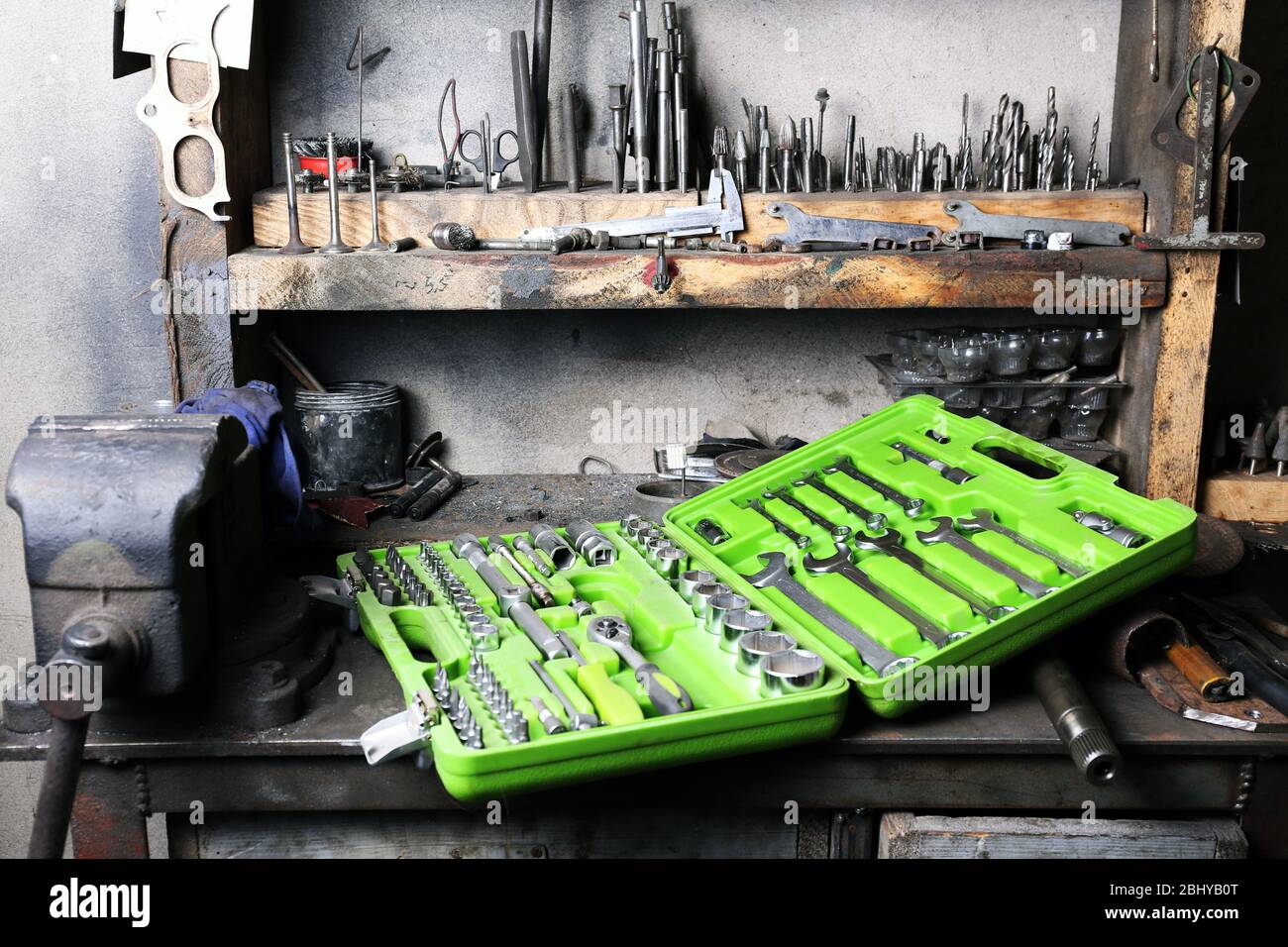 Different tools on workplace in garage Stock Photo - Alamy