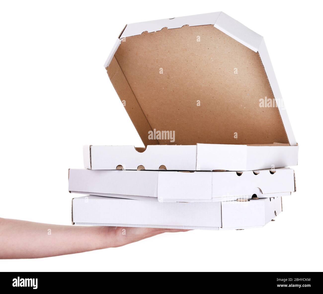 Hand holding pizza boxes isolated on white Stock Photo - Alamy