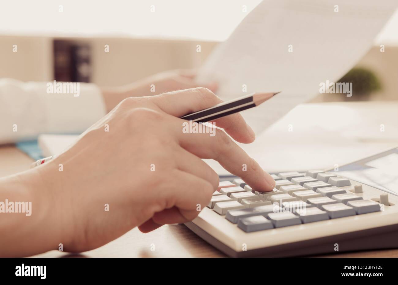 entrepreneur calculation and reviewing investment plan. concept of ...