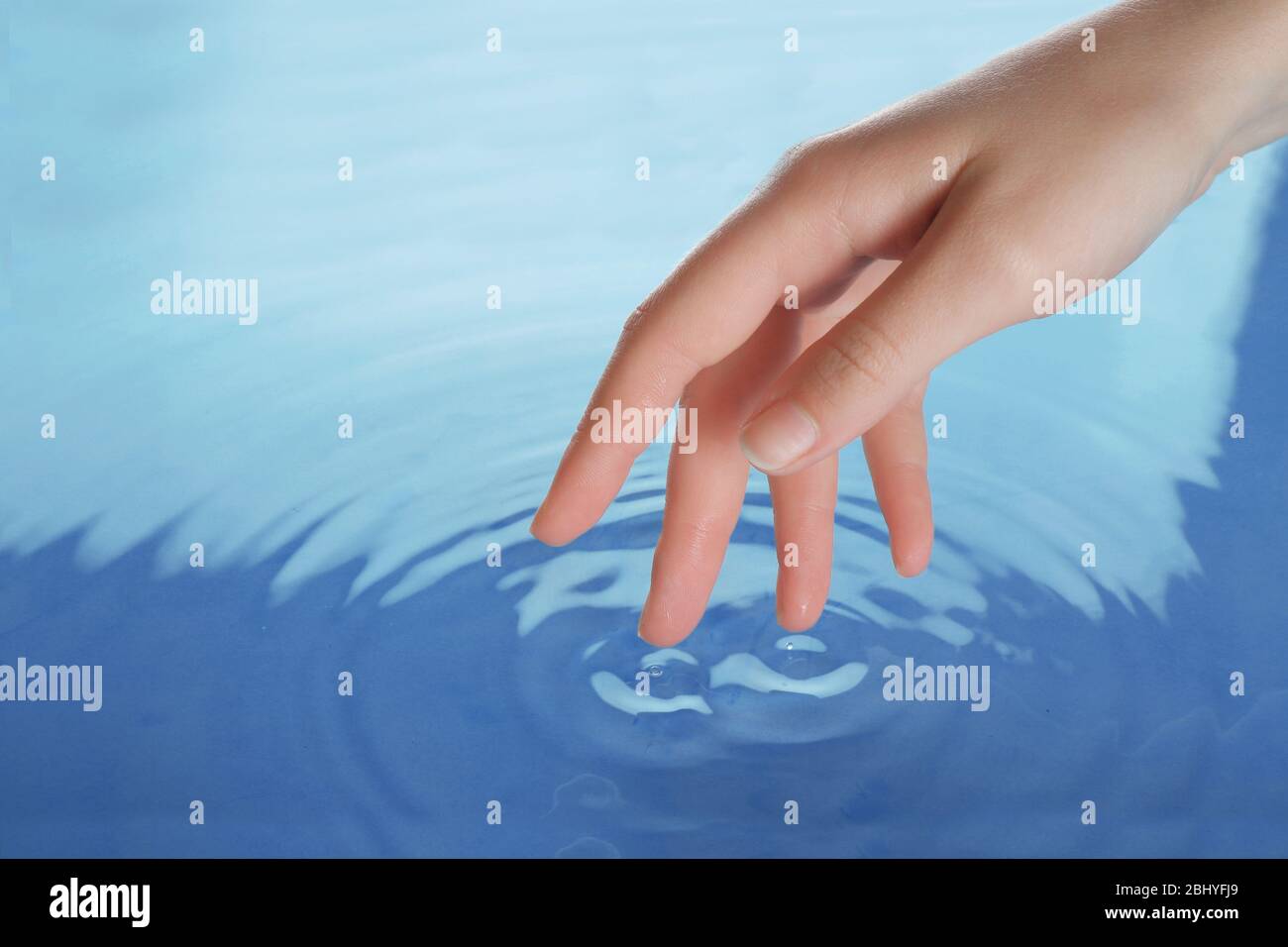 Finger touches water close hi-res stock photography and images - Alamy