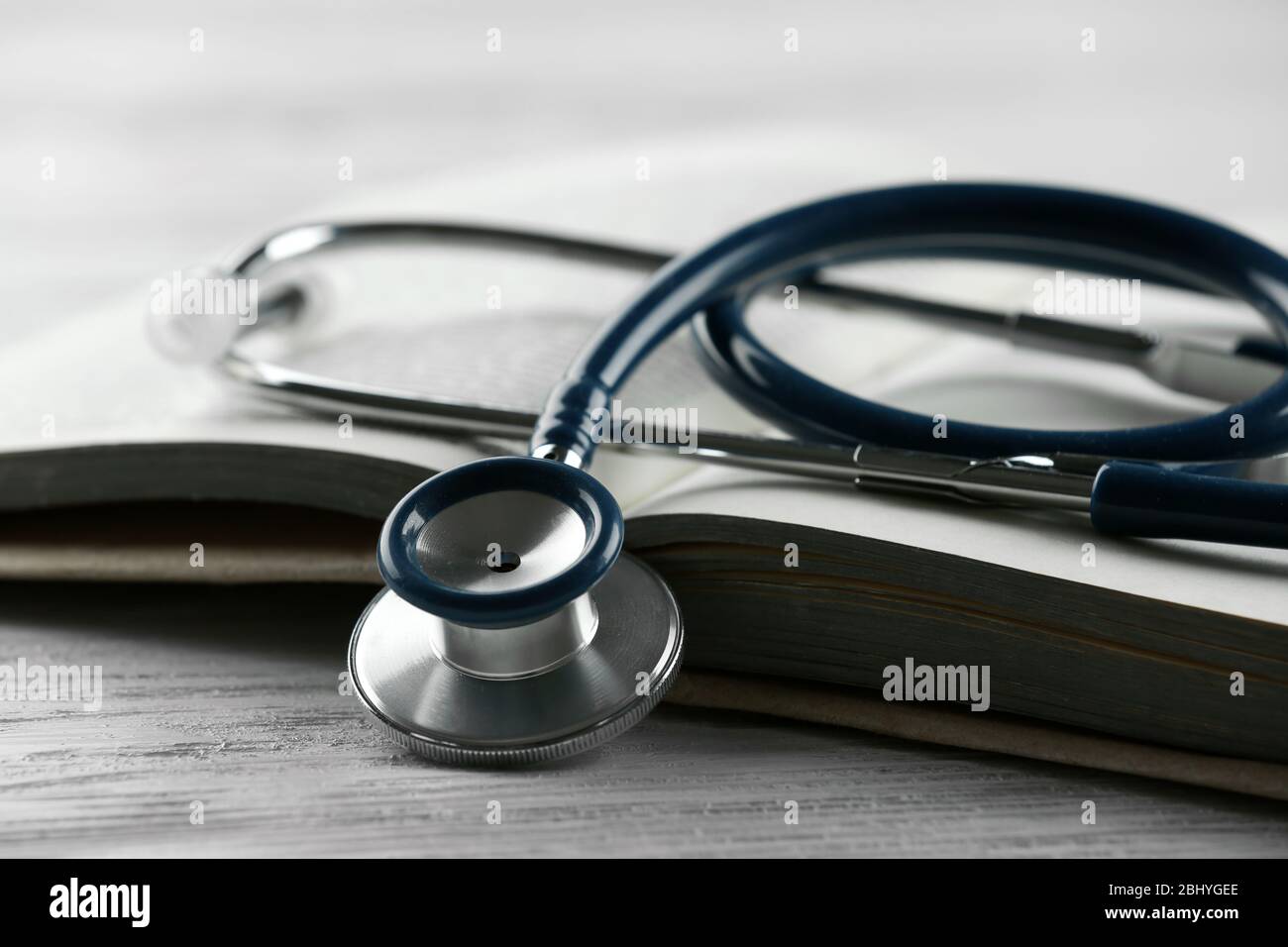 Stethoscope on open book close up Stock Photo - Alamy