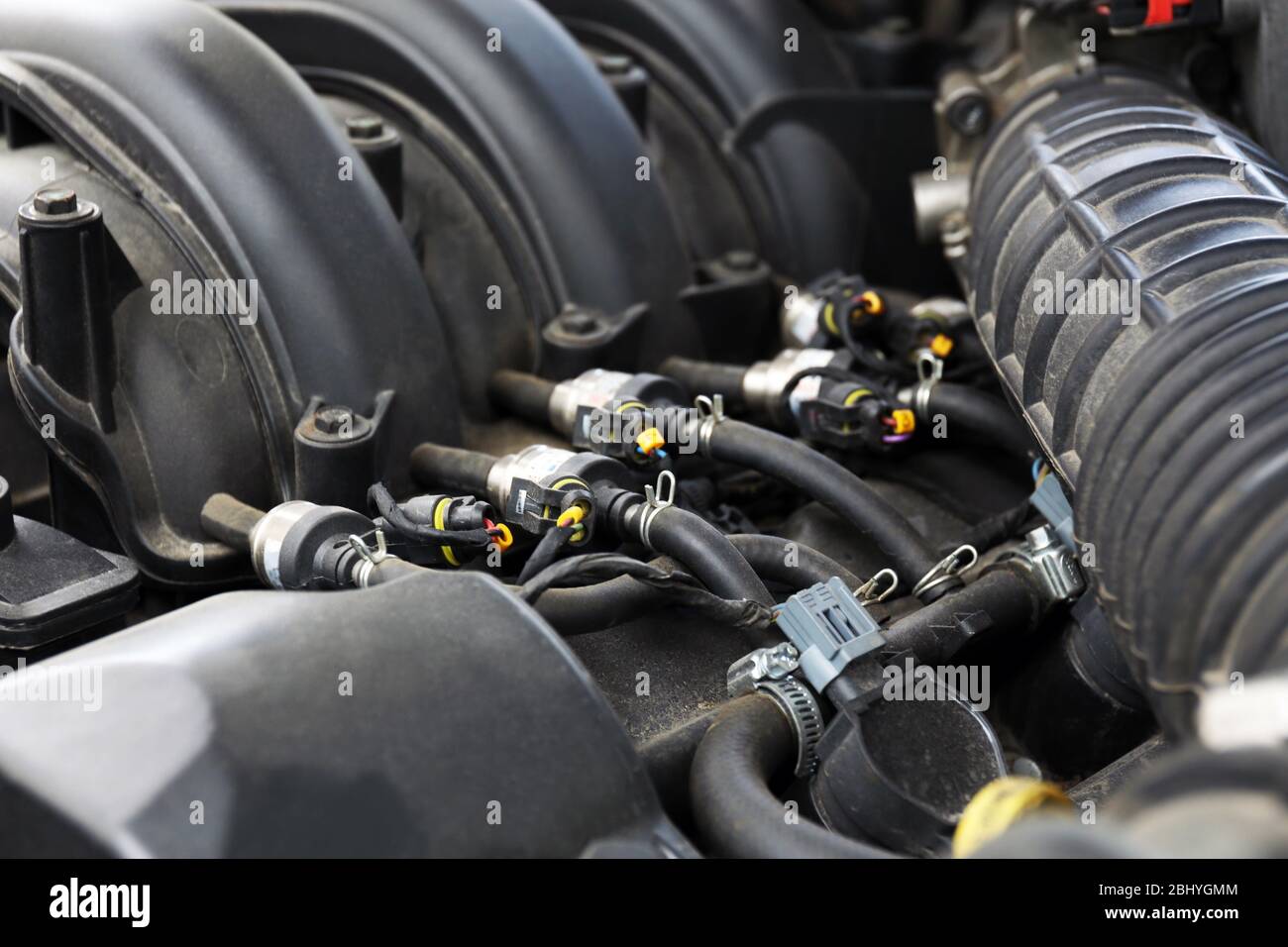Engine under hood of car Stock Photo - Alamy