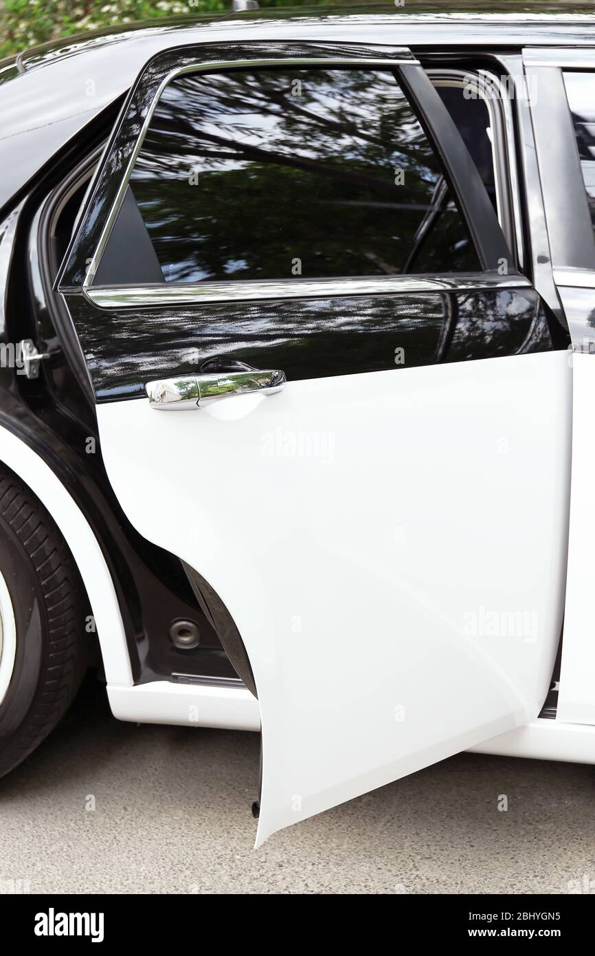 Modern car with open door Stock Photo - Alamy