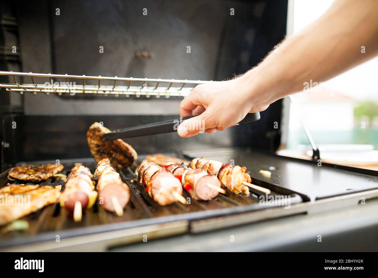 Gas fire hands young hi-res stock photography and images - Alamy