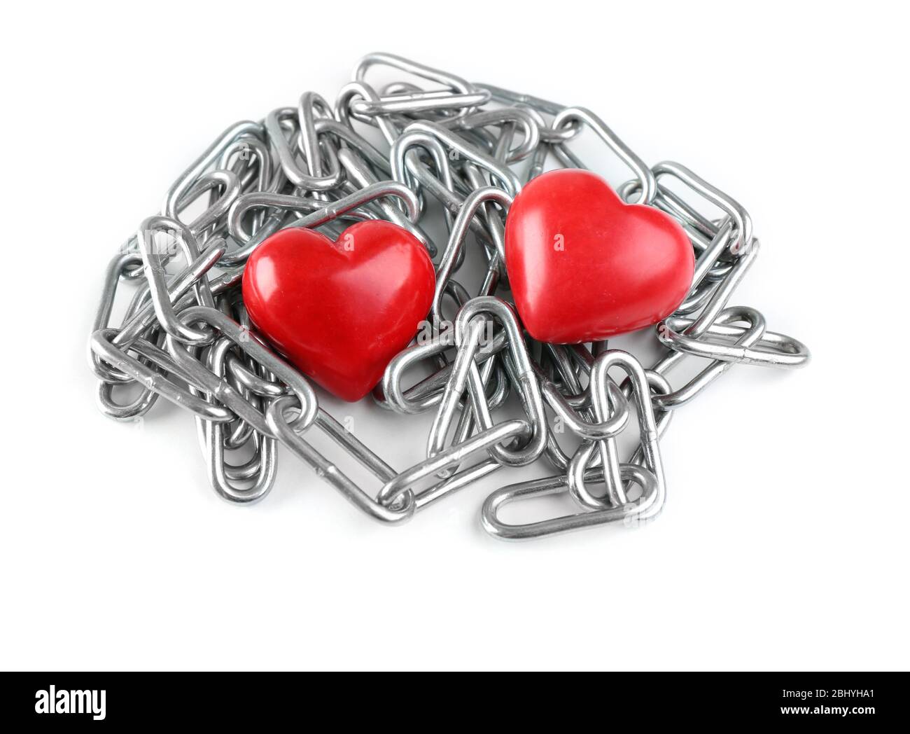 Two red hearts with metal chain isolated on white Stock Photo - Alamy