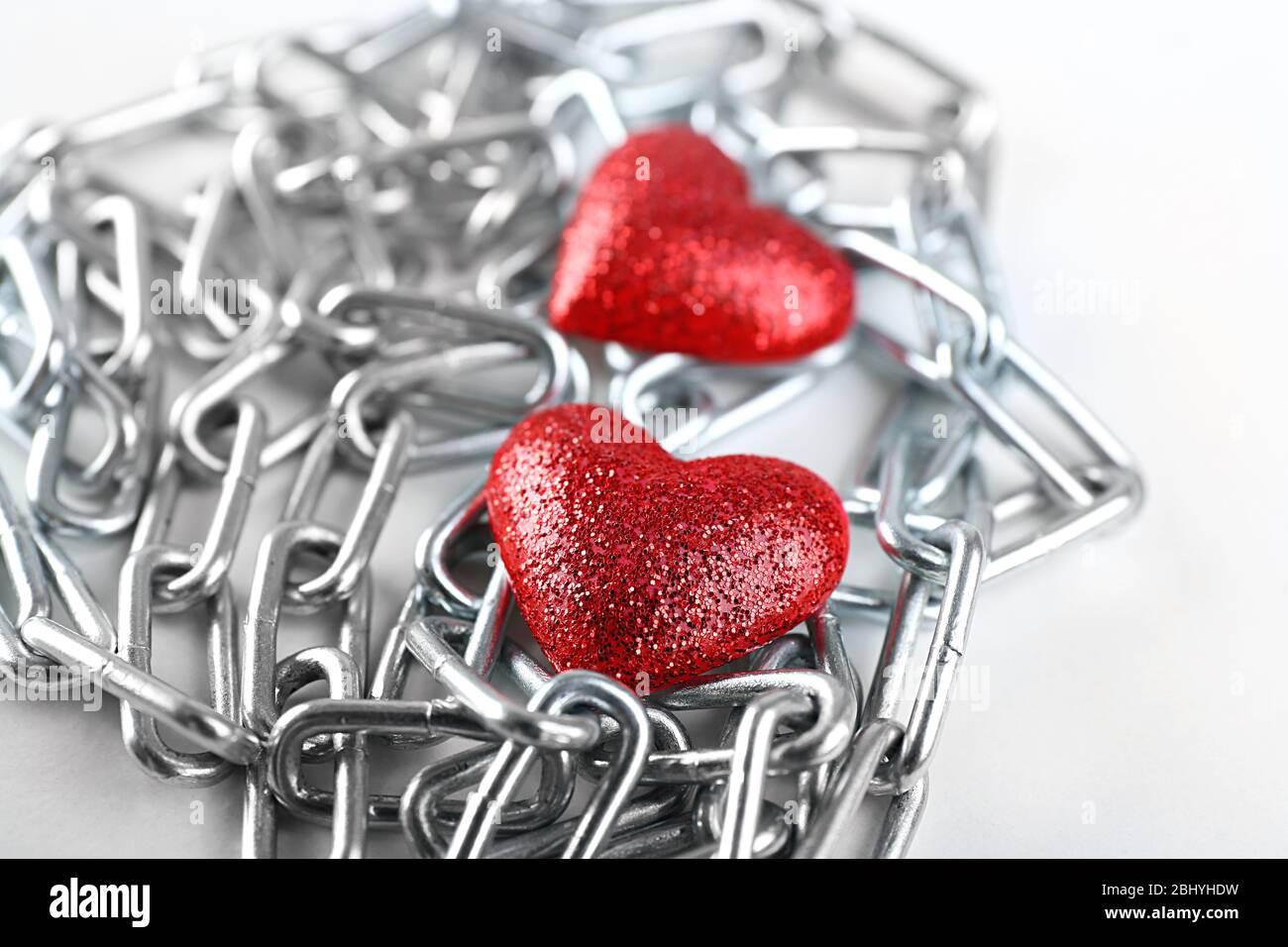 Two connected hearts hi-res stock photography and images - Alamy