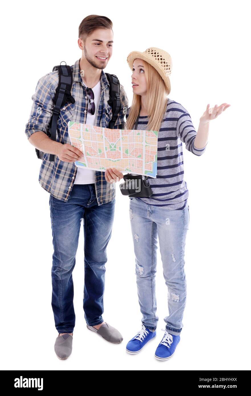 Pair of travelers with map isolated on white Stock Photo - Alamy