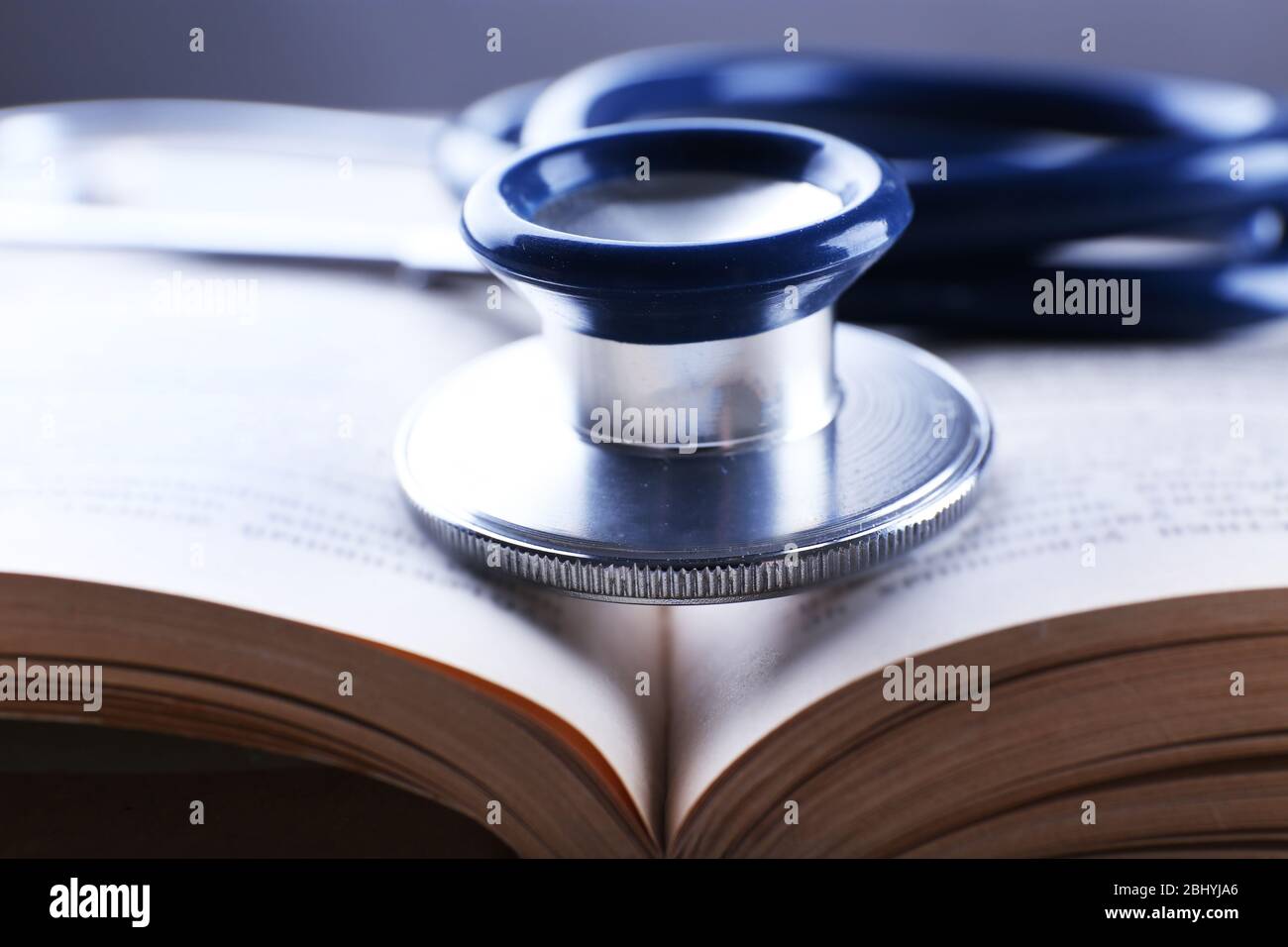 Stethoscope on book, closeup Stock Photo - Alamy