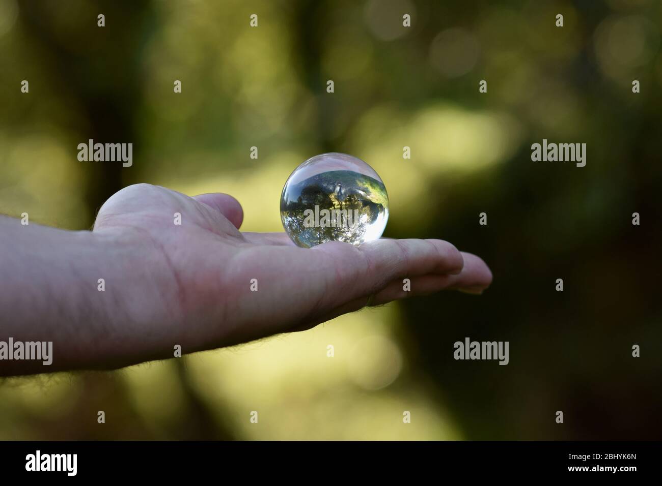 Man holding sphere hi-res stock photography and images - Alamy