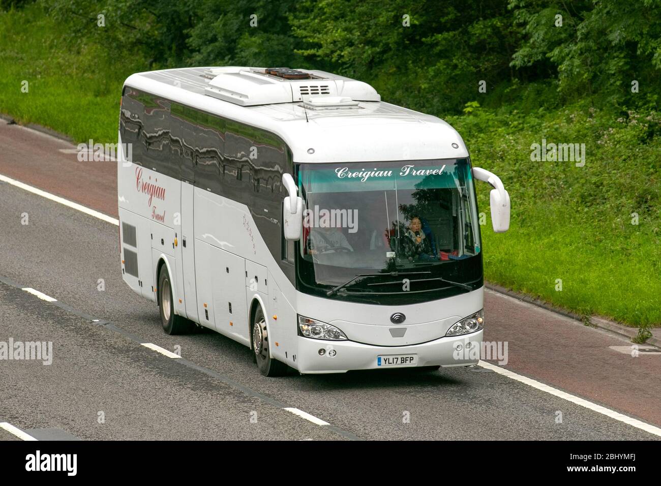 Creigiau Travel Ltd. 2017 white Yutong Tc12 Auto; coaches travelling on ...