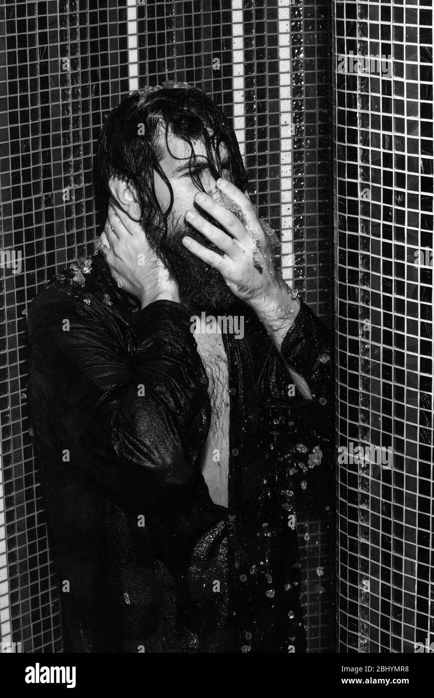 Energized handsome man, bearded hipster with beard and moustache in red ...