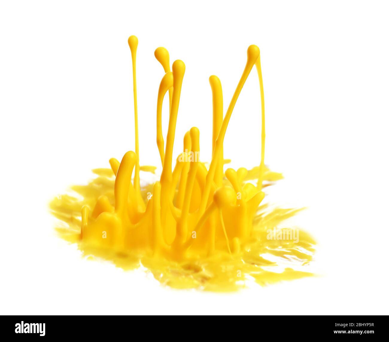 Explosions yellow paint isolated on white Stock Photo - Alamy