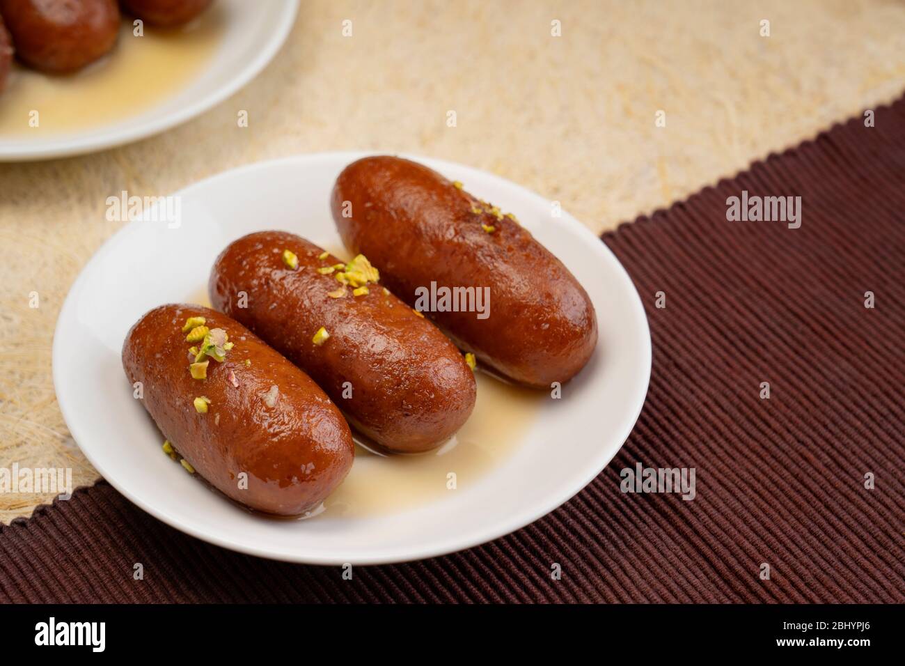 Delicious langcha kept in a plate on the table Stock Photo - Alamy