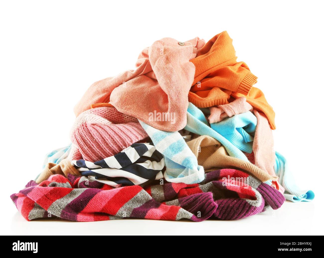 Heap of different clothes, isolated on white Stock Photo - Alamy