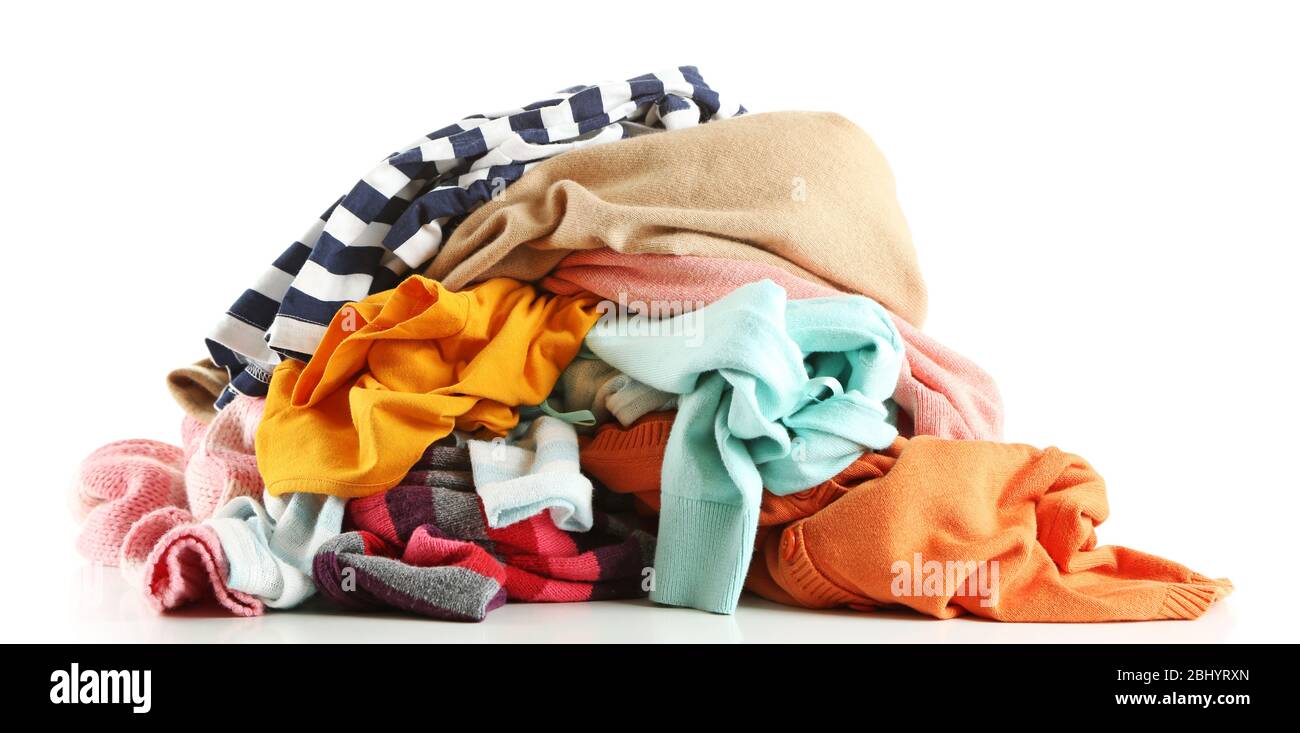 Heap of different clothes, isolated on white Stock Photo - Alamy