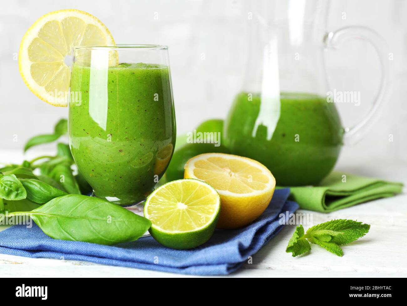 Healthy green smoothie on wooden table, closeup Stock Photo - Alamy