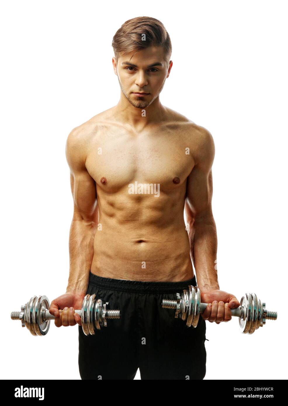 Muscle young man holding dumbbells isolated on white Stock Photo - Alamy