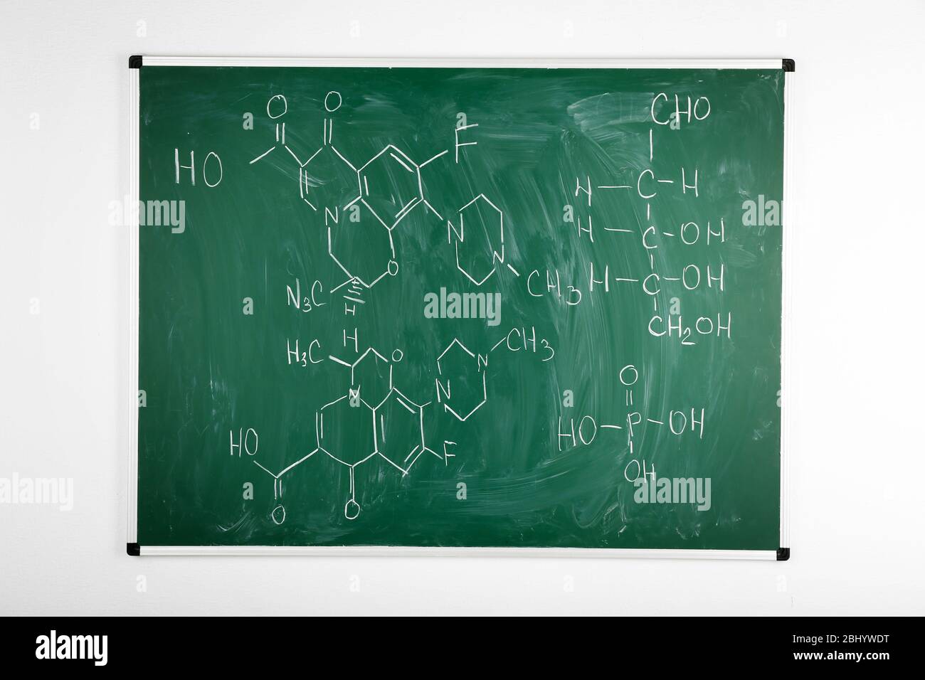 Molecule models and formulas on blackboard background Stock Photo - Alamy