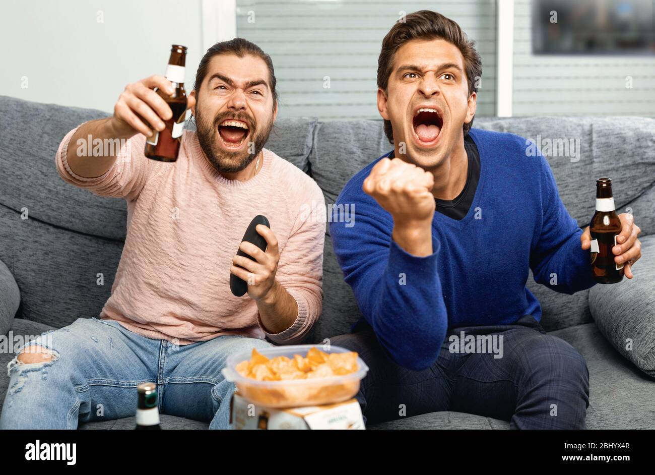Two guys drinking beer on hi-res stock photography and images - Alamy