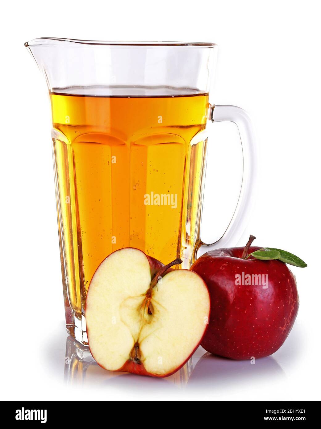 Full jug of apple juice and fruit isolated on white Stock Photo - Alamy