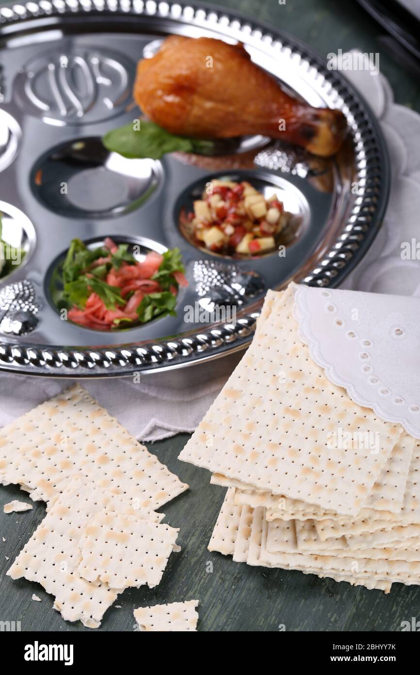 Matzo for Passover with Seder meal on plate on table close up Stock ...