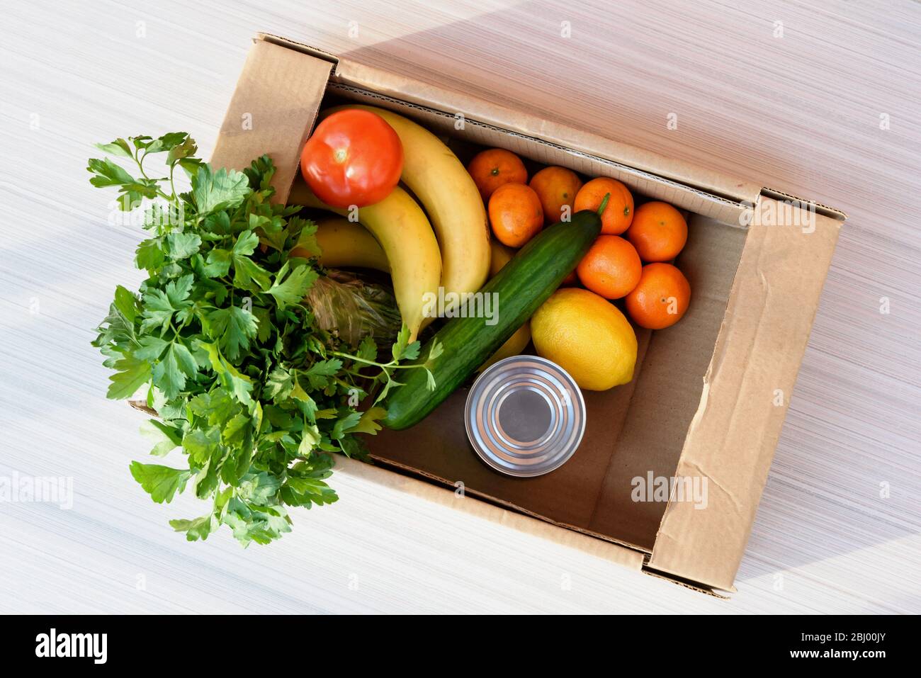 Donation box full of groceries, fruits and vegetables. View from top ...