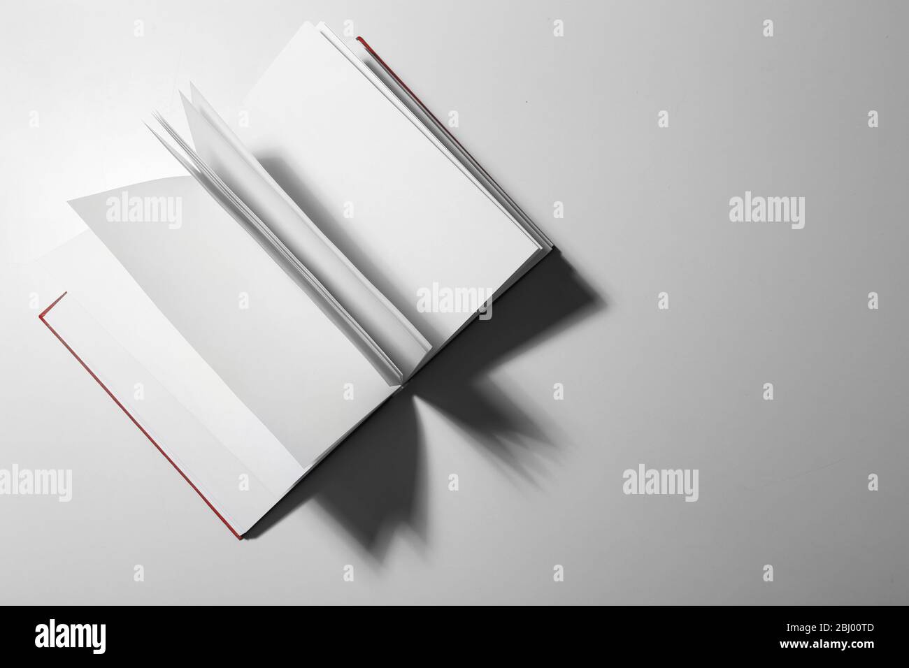 Blank book on white background Stock Photo - Alamy