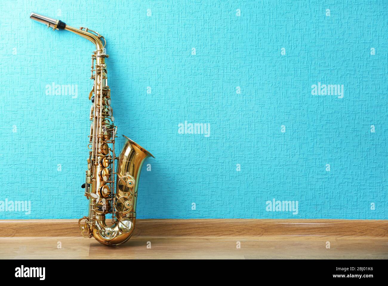 Golden shiny alto saxophone blue hi-res stock photography and images ...
