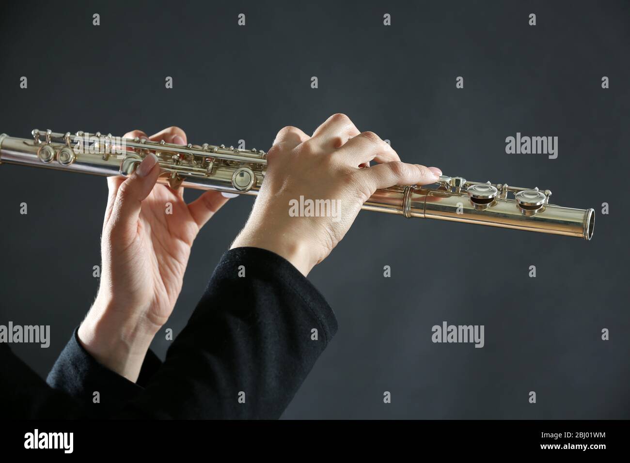 Hands woman playing on woodwind hi-res stock photography and images - Alamy
