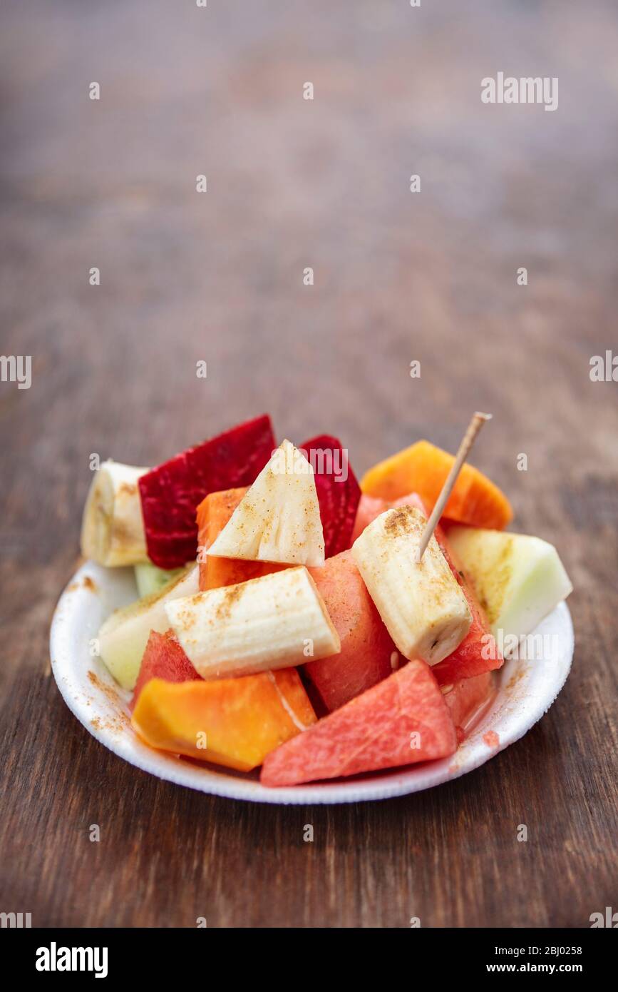 Freshly cut fruit selling on street Stock Photo - Alamy
