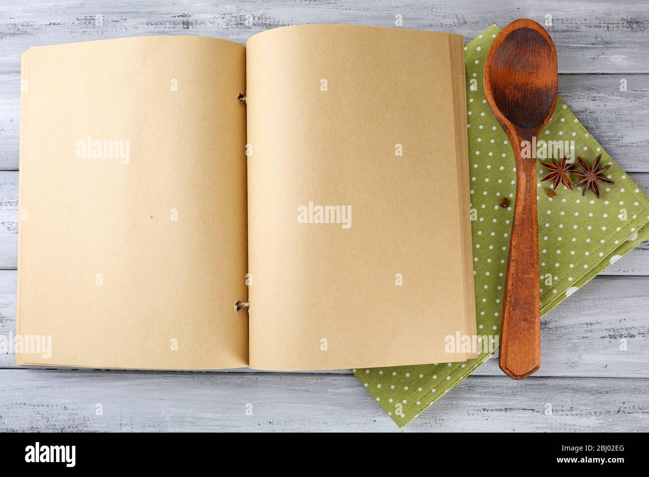 Open recipe book on wooden background Stock Photo - Alamy