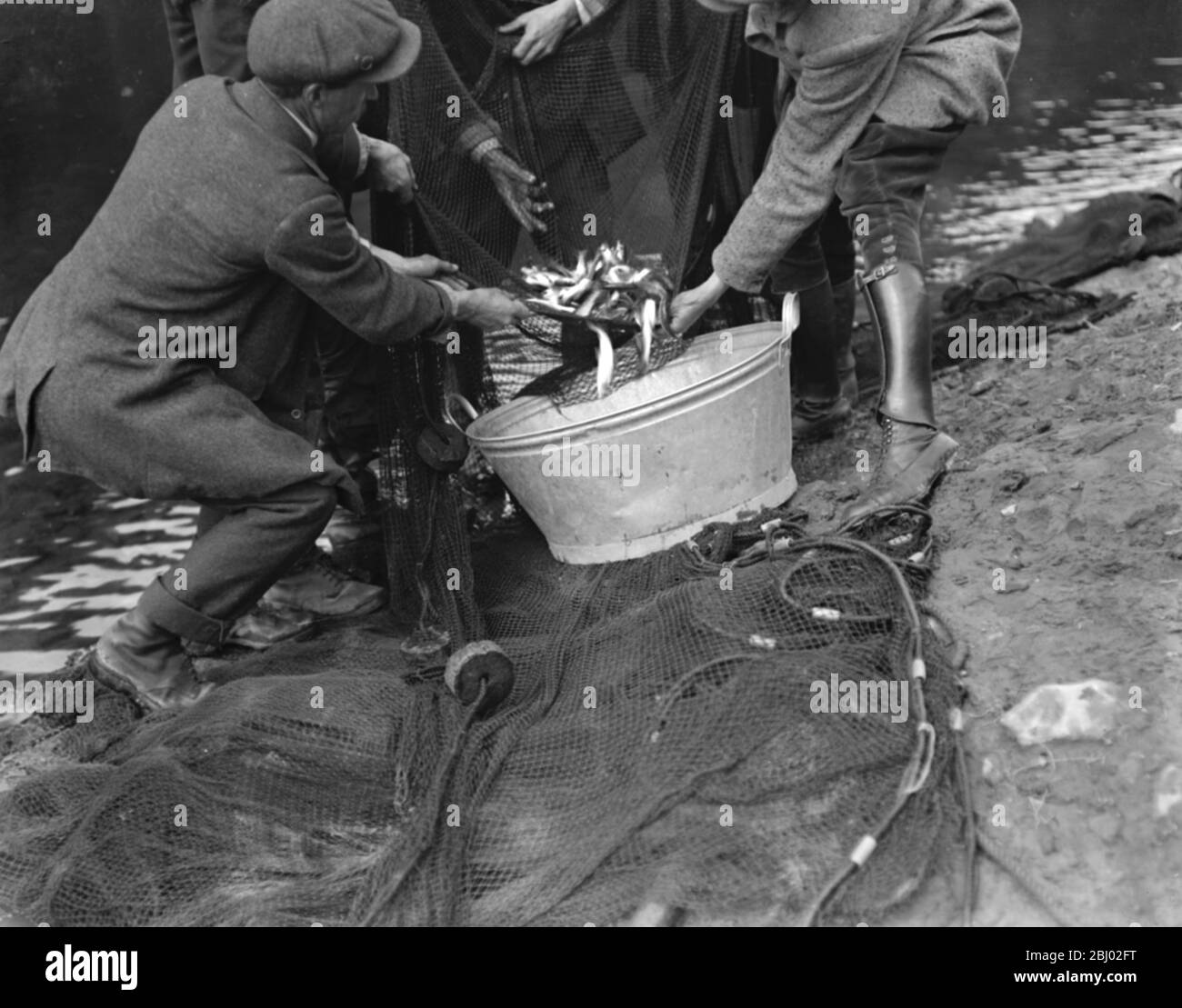 Fishing salmon on river Black and White Stock Photos & Images - Alamy