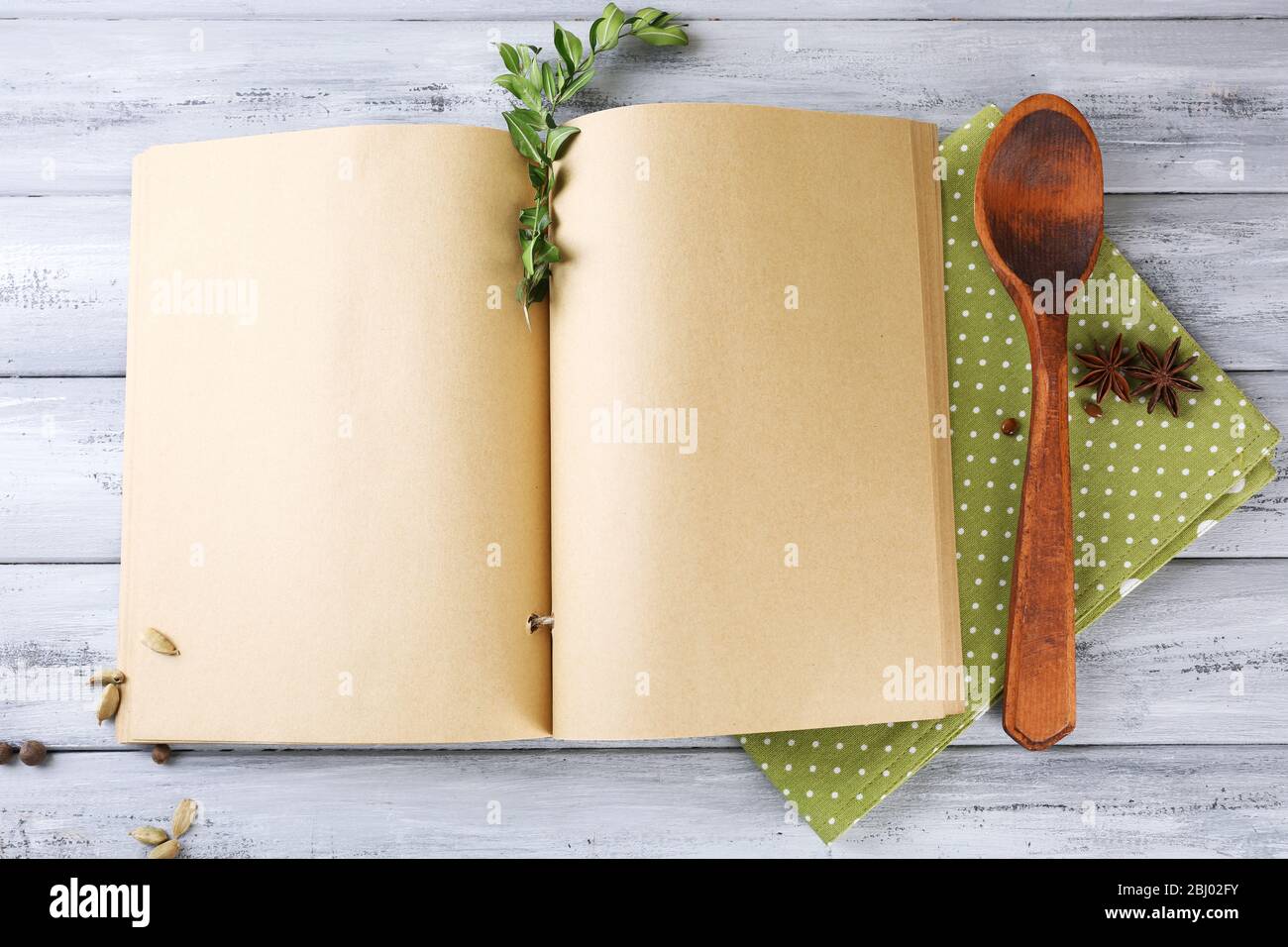 Open recipe book on wooden background Stock Photo - Alamy