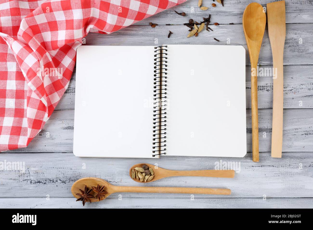 Open recipe book on wooden background Stock Photo - Alamy