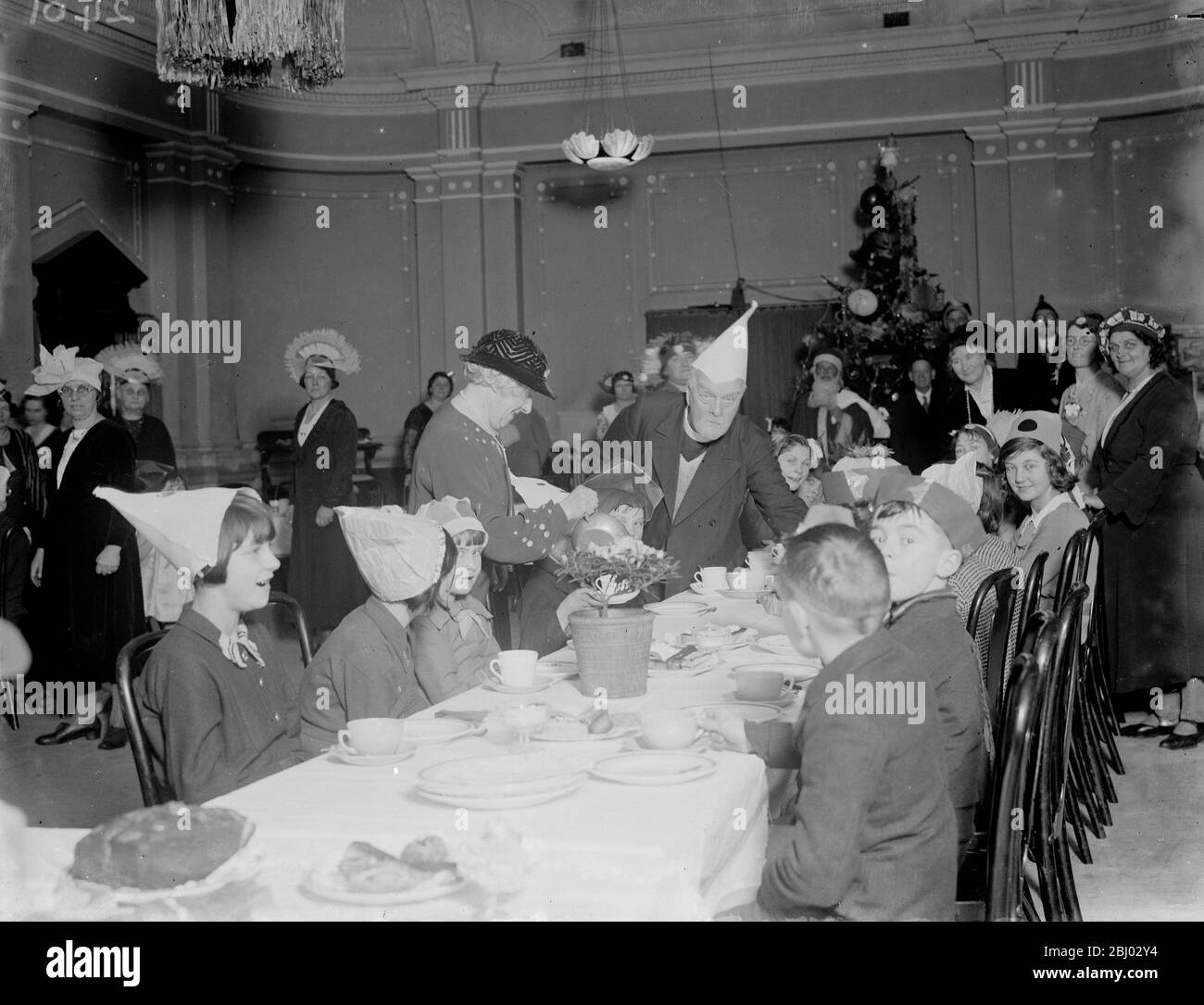 The ' Old Contemptibles ' childrens party . Serving the children their ...