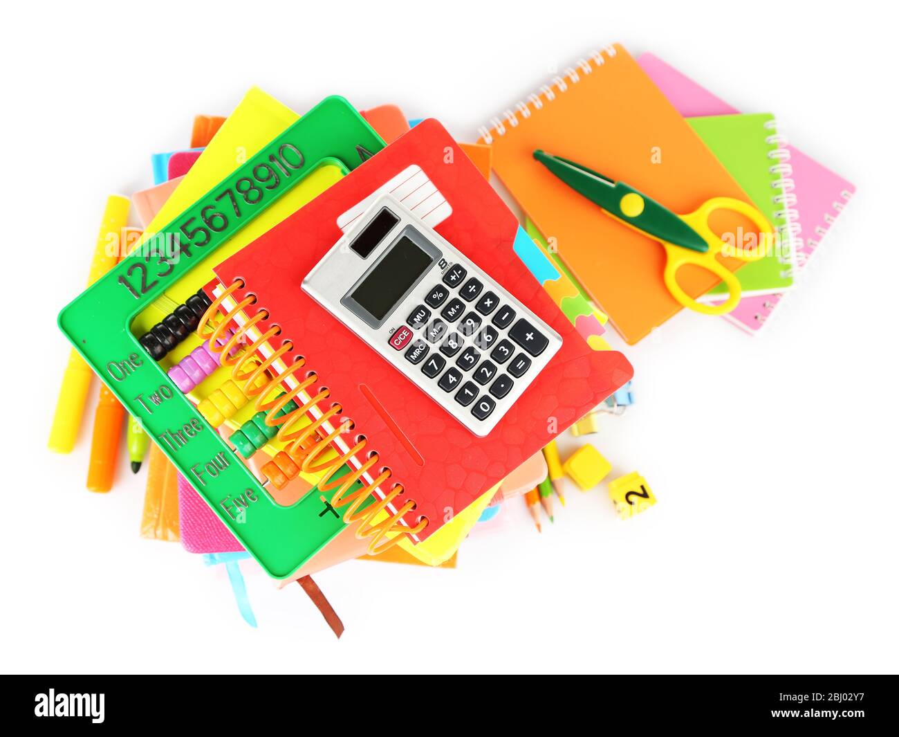 Stack of books and stationery isolated on white Stock Photo - Alamy